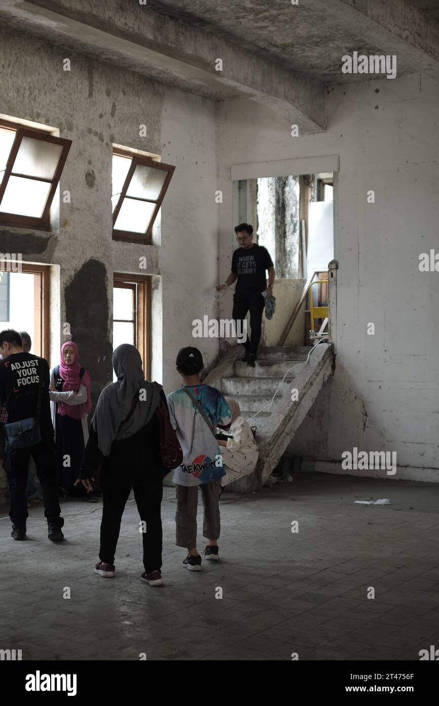 A full gathering of urban professionals indoors Stock Photo - Alamy