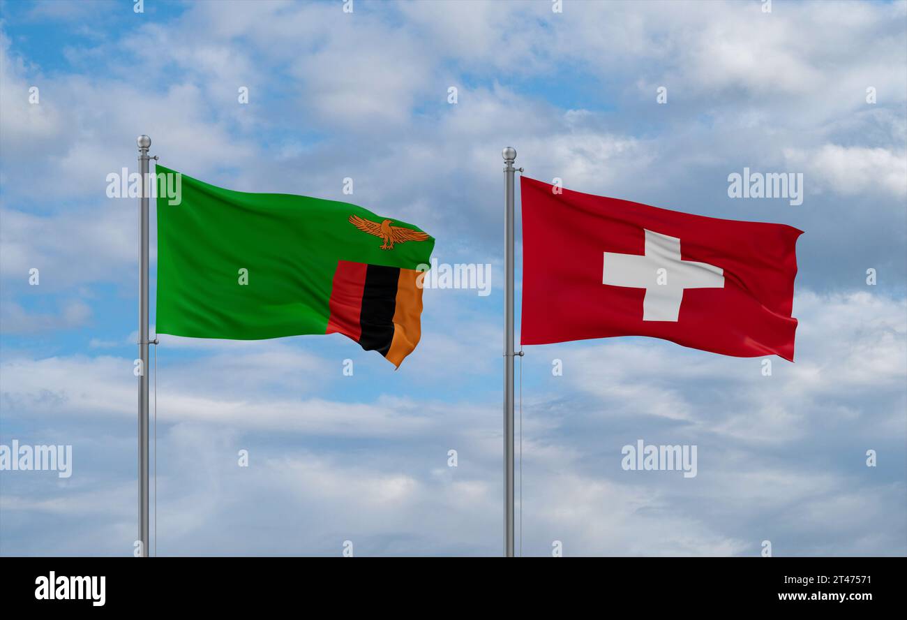 Switzerland and Zambia flags waving together in the wind on blue cloudy ...
