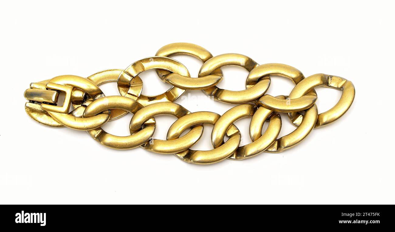 Golden hand bracelet isolated on white background Stock Photo - Alamy