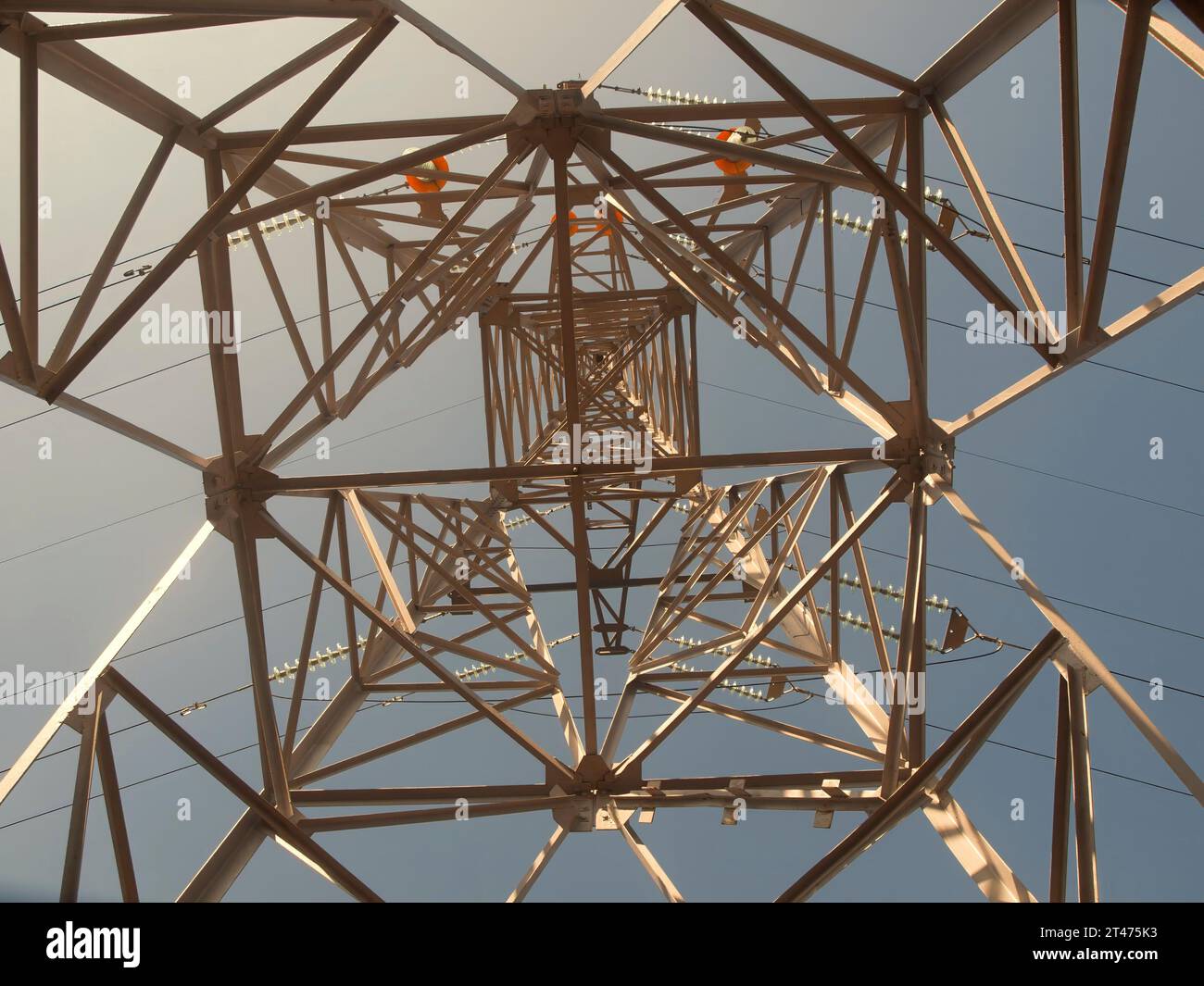 High voltage post metal construction, view from inside Stock Photo - Alamy