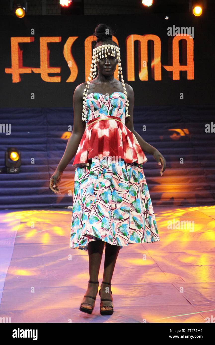 Cotonou. 28th Oct, 2023. A model presents a creation during the 15th ...
