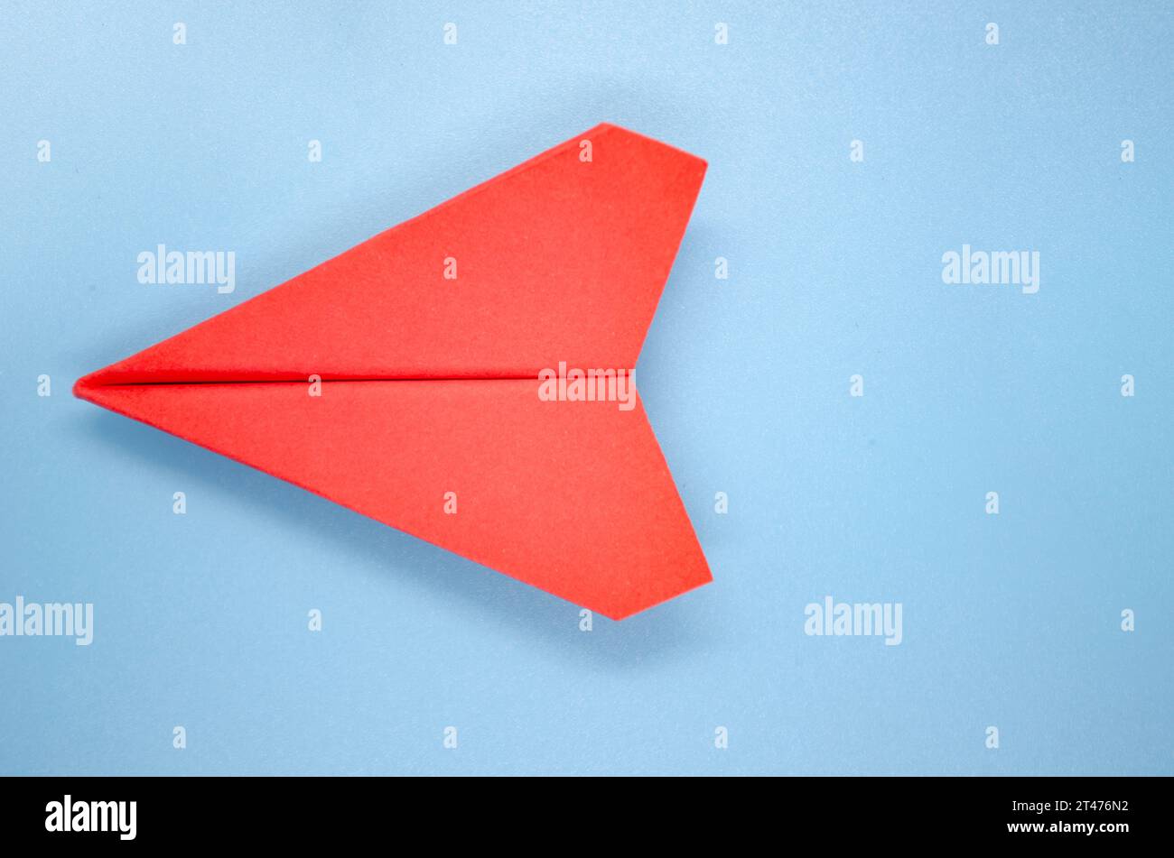 Red paper airplane hi-res stock photography and images - Alamy