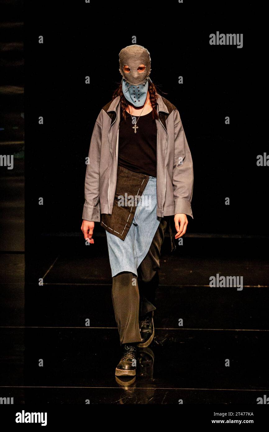 A model walks the runway during the Ffancy Choice fashion show at the ...