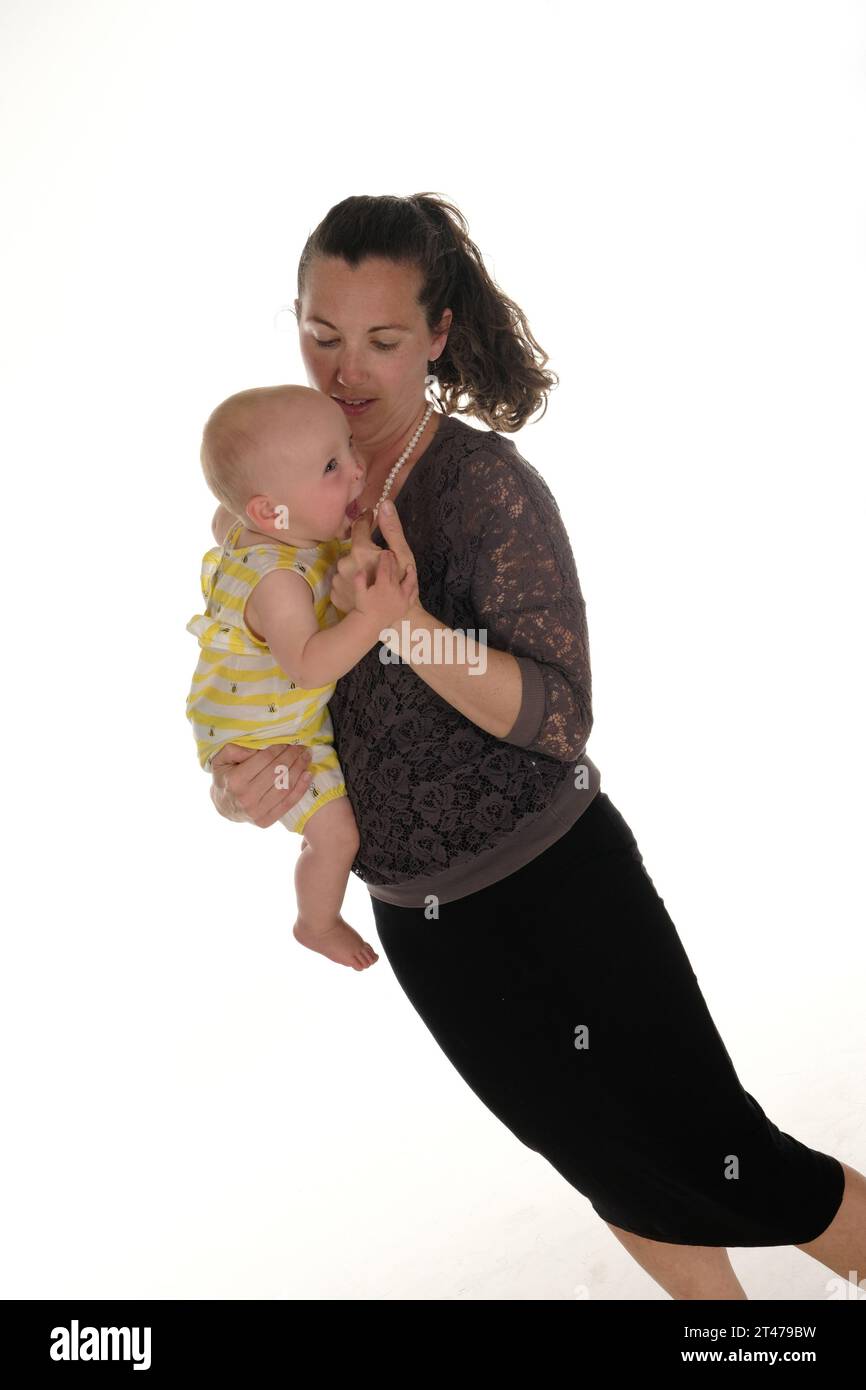 Baby standing up with parent hi-res stock photography and images - Alamy