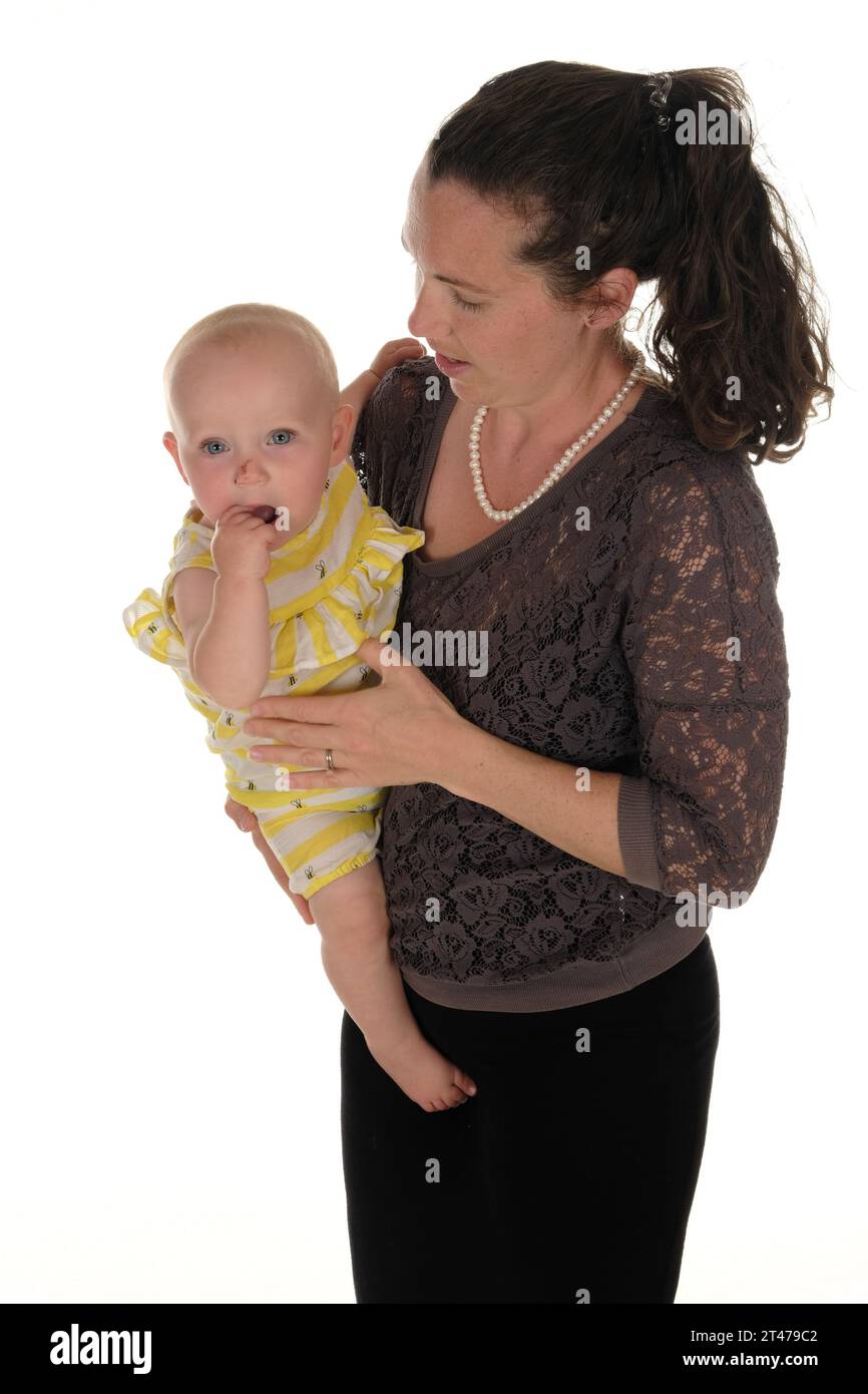 Baby standing up with parent hi-res stock photography and images - Alamy