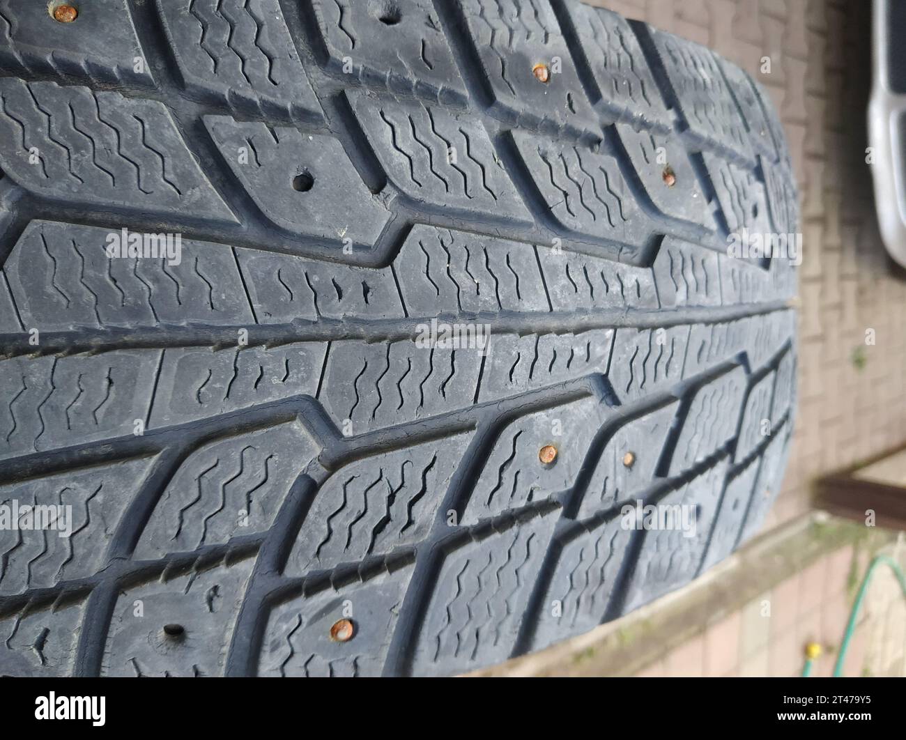 Old worn car tires. Damaged rubber. Old tyres. Recycling of rubber ...