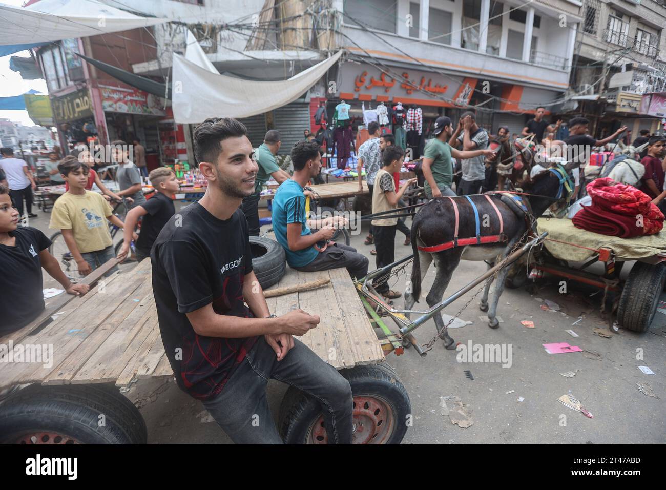 A Palestinian man uses animal-drawn cart as taxis to move between ...