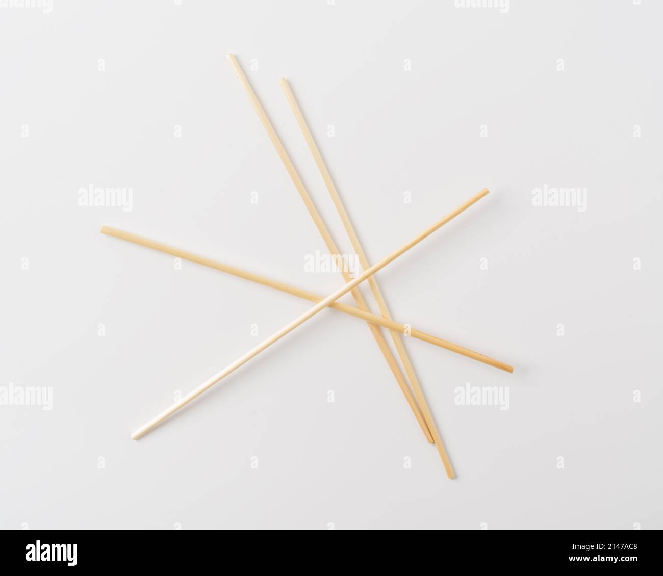 biodegradable drinking straw made from dried grass on white background ...