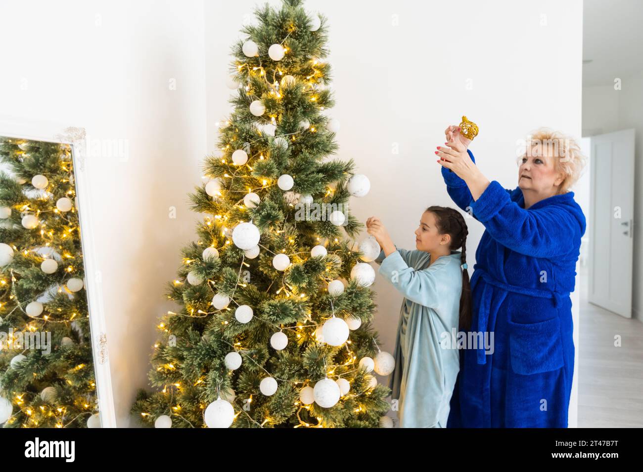 Happy grandmother granddaughter decorating hi-res stock photography and ...
