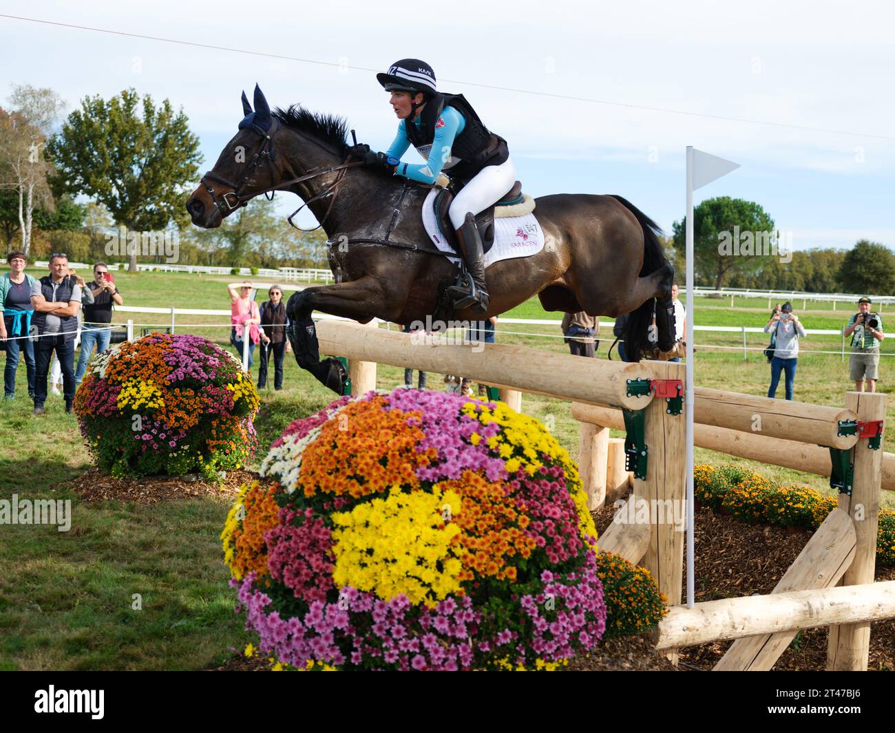 Muzi POTTINGER of New Zealand with Just Kidding during the cross ...