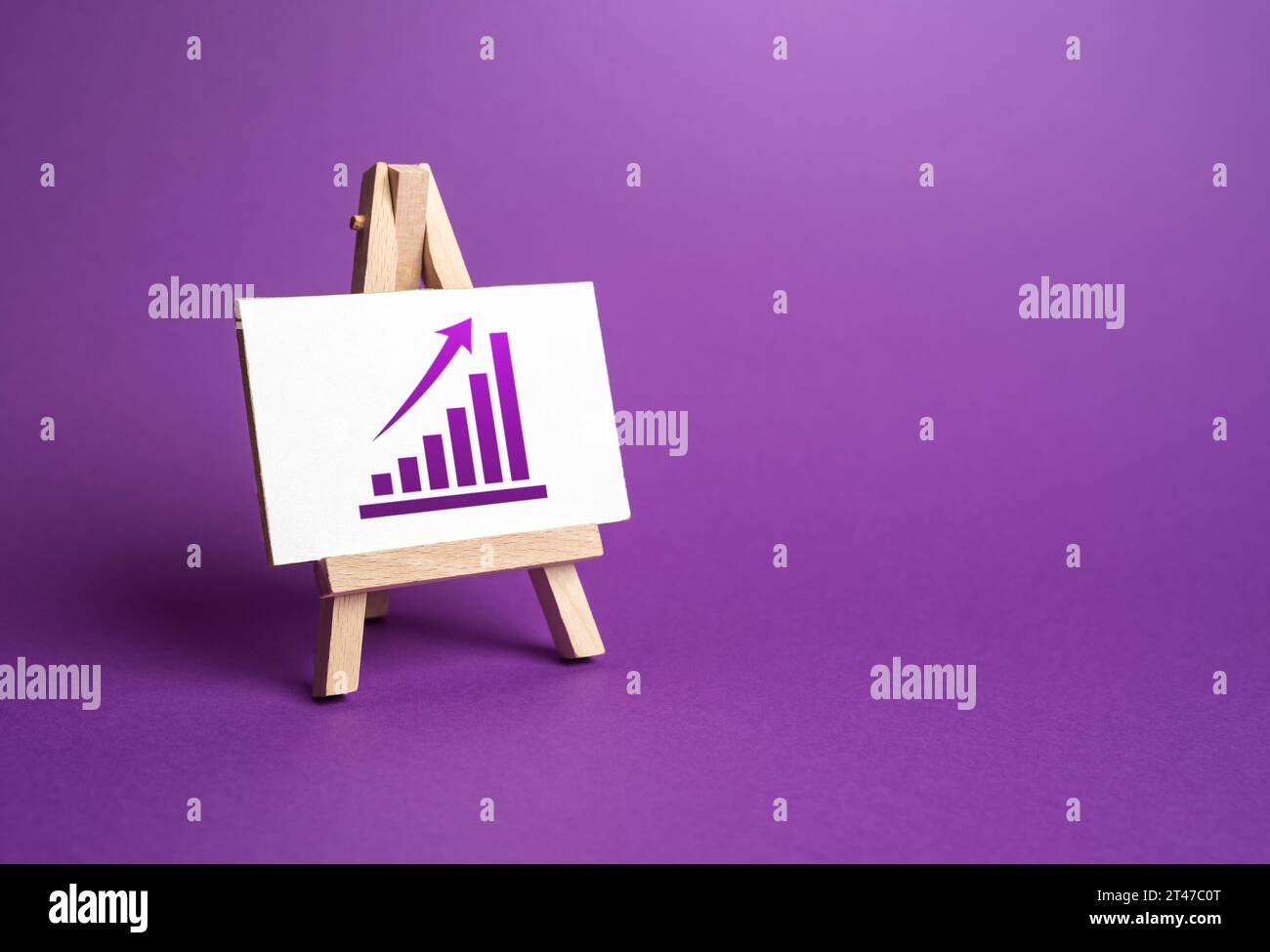 Easel with a growing trend graph. Capital increase. Expanding ...