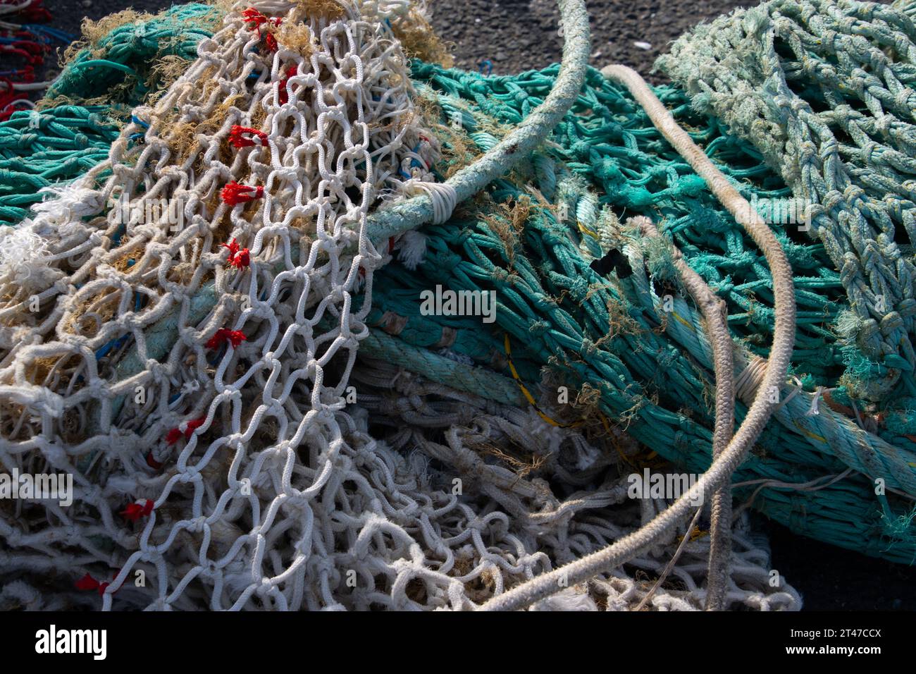 Close up of empty colorful fishing nets Stock Photo - Alamy
