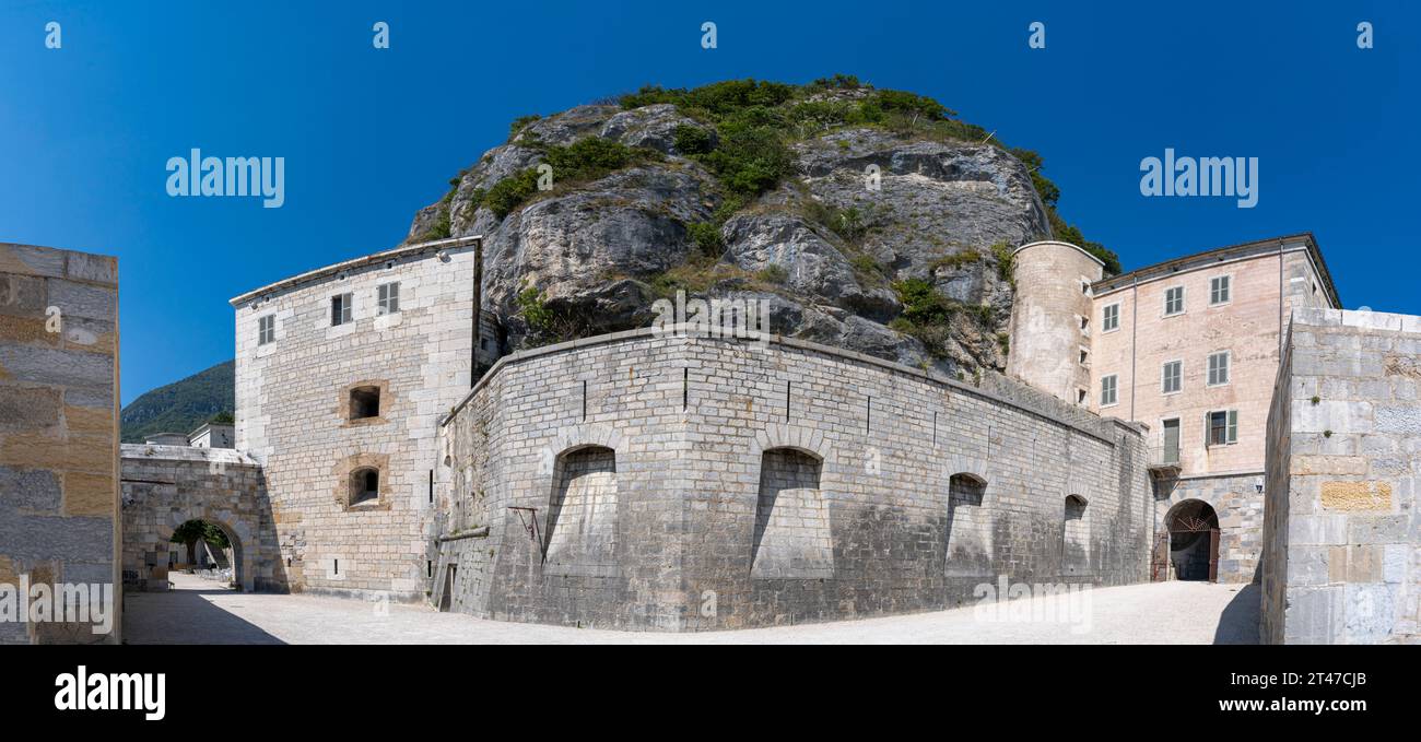 View of the upper fort courtyard and the rock behind Stock Photo - Alamy