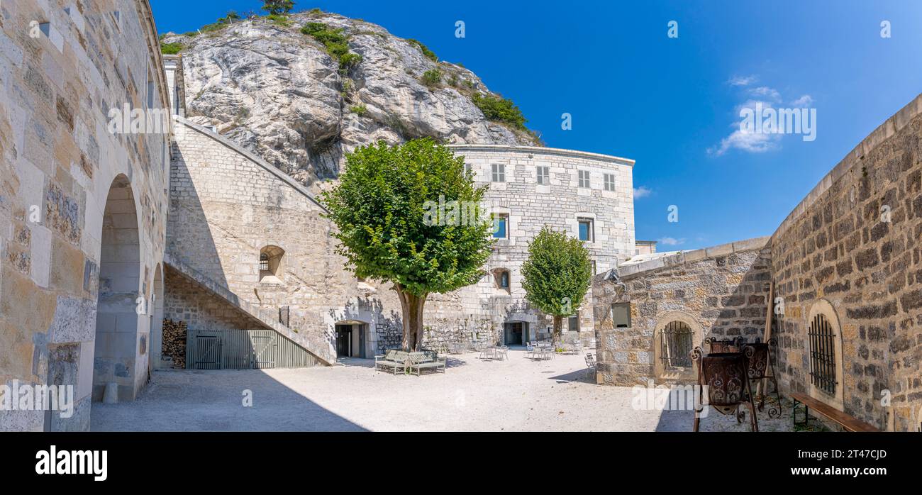 View of the upper fort courtyard with trees and the rock behind Stock ...