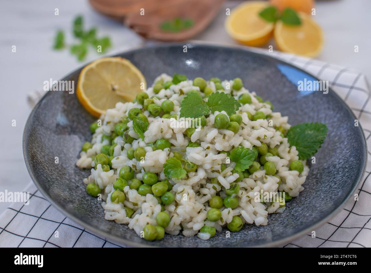 Plate of green pea risotto with green pea Stock Photo - Alamy