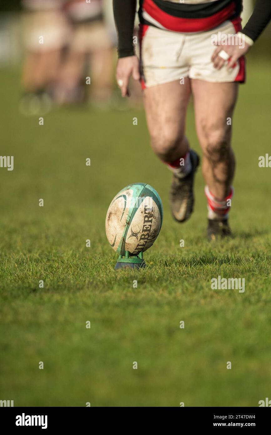 Gilbert rugby union football on a stand ready to be kicked Stock Photo ...