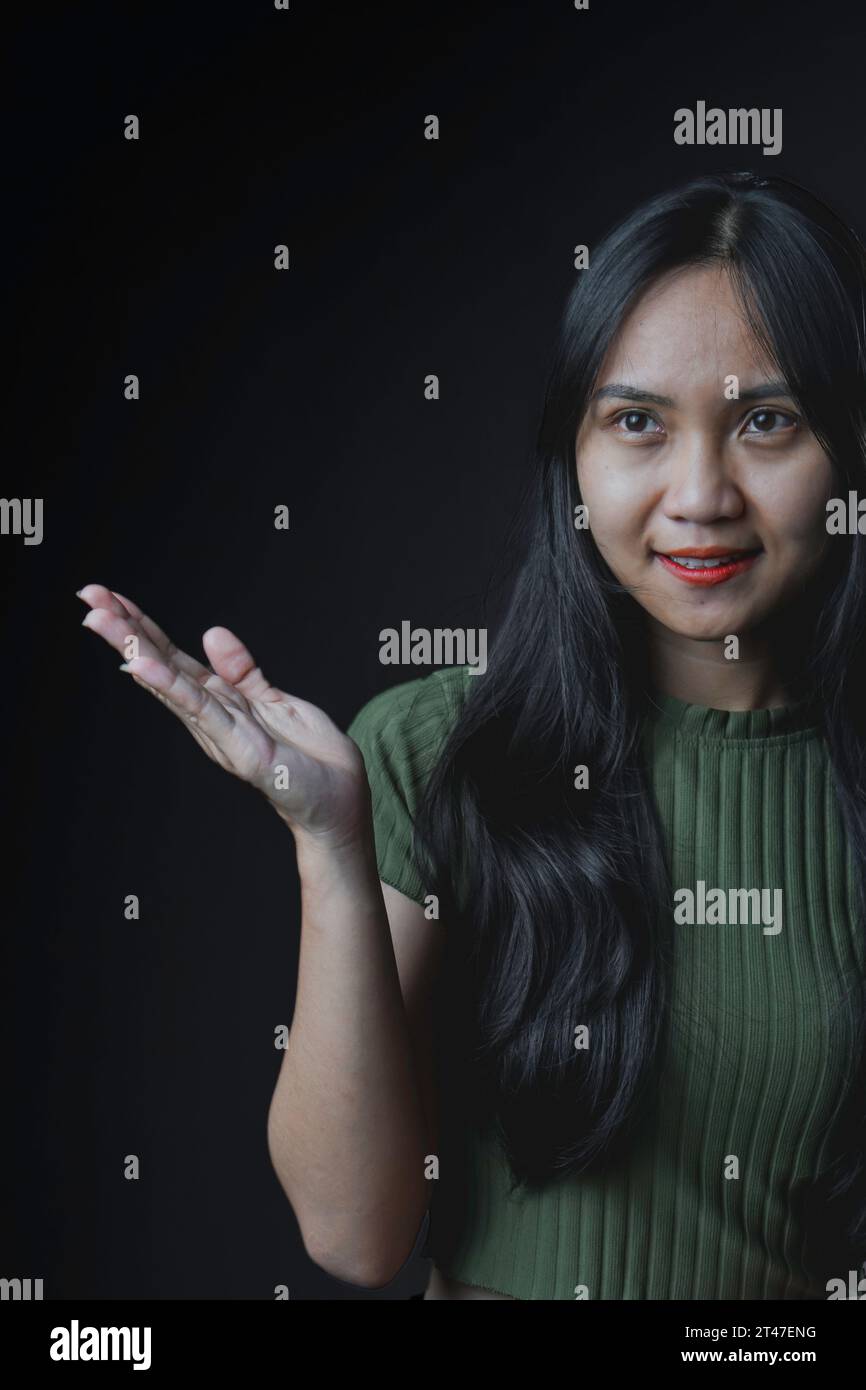 Photo of female person showing her hand up Stock Photo - Alamy