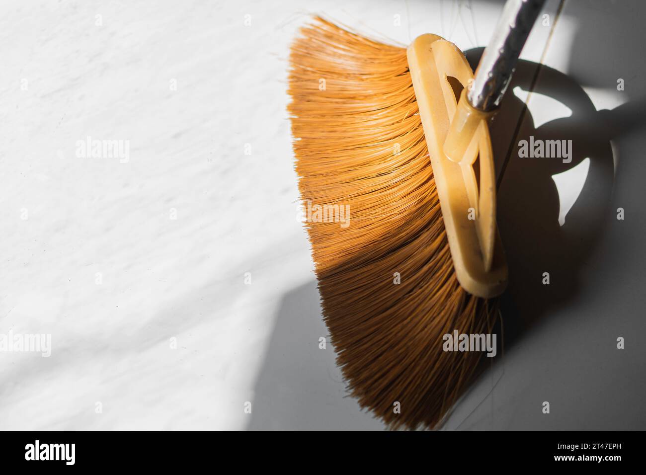 Cleaning house Sweeping floor with broom Stock Photo - Alamy