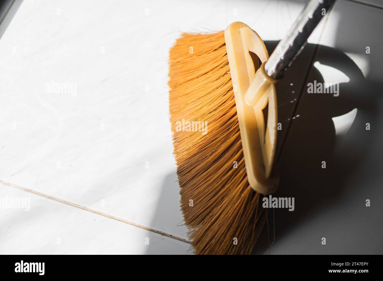 Cleaning house Sweeping floor with broom Stock Photo - Alamy