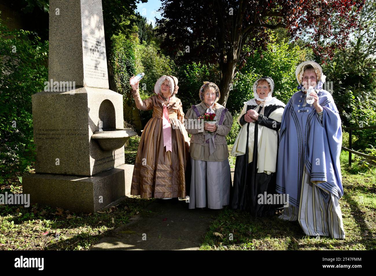 Ladies in Victorian period dress costumes in Ironbridge, Shropshire a ...