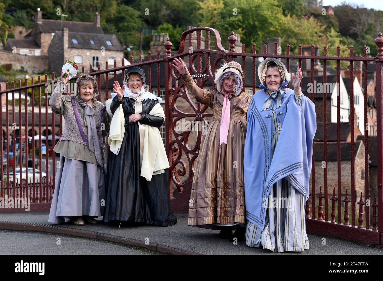 Ladies in Victorian period dress costumes in Ironbridge, Shropshire a ...