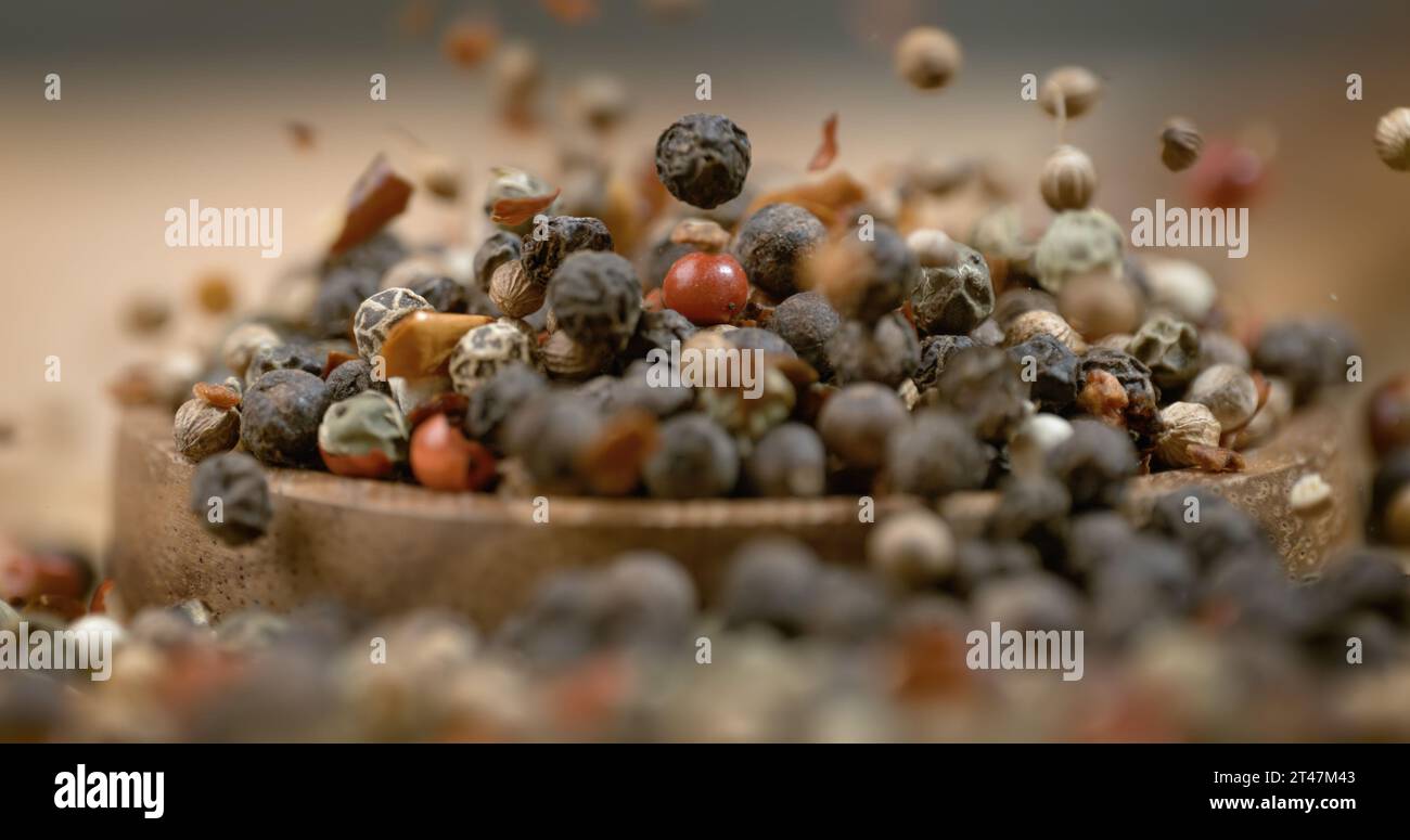Close up green peppercorns falling hi-res stock photography and images ...