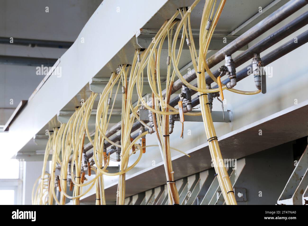 plastic pipe and control valves in the manufacturing production line ...