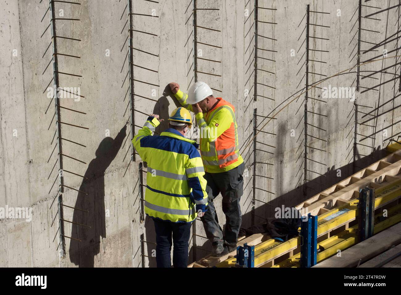 Construction Worker At A Building Site, Employee In Construction ...