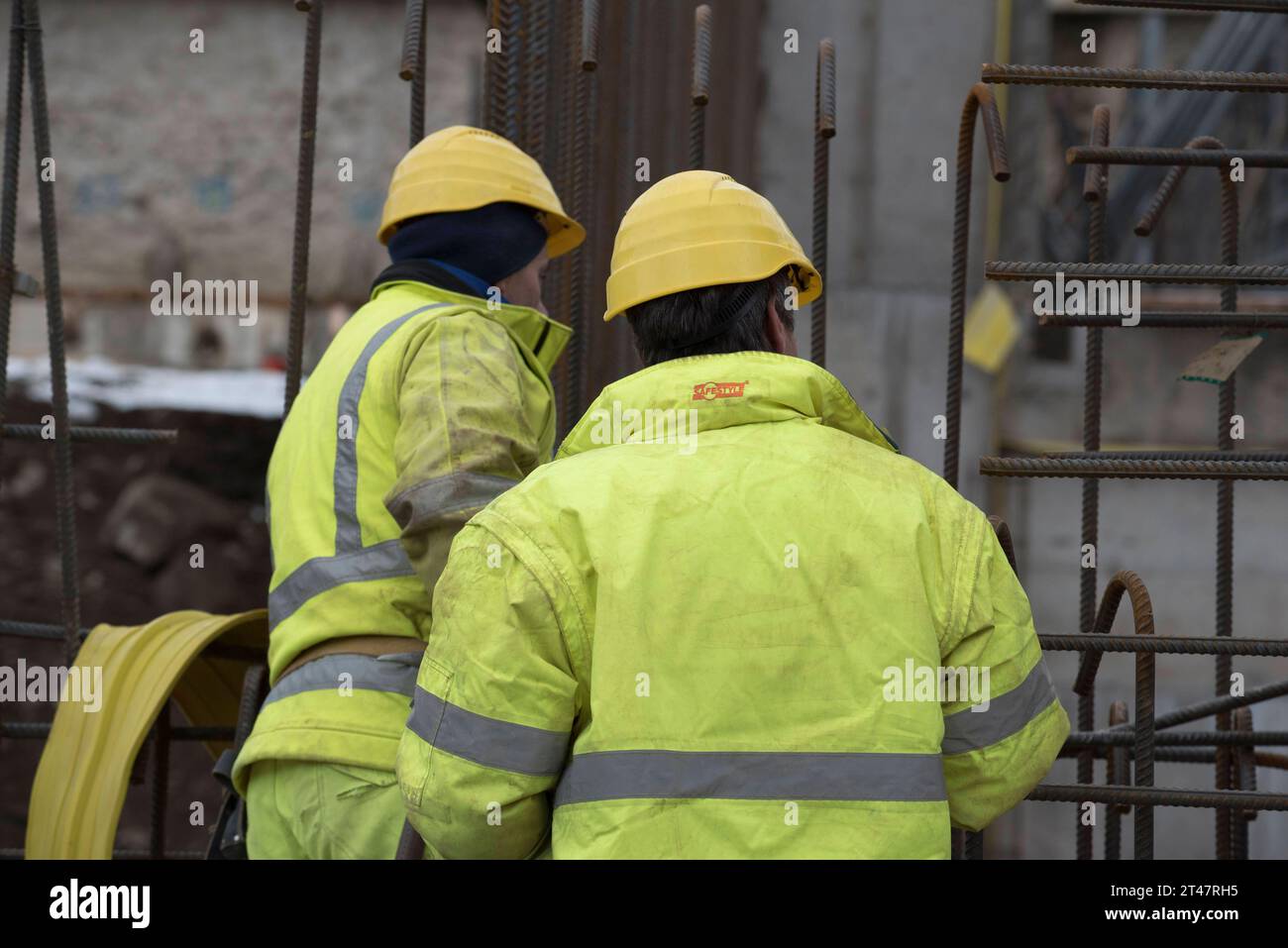Construction Worker At A Building Site, Employee In Construction ...