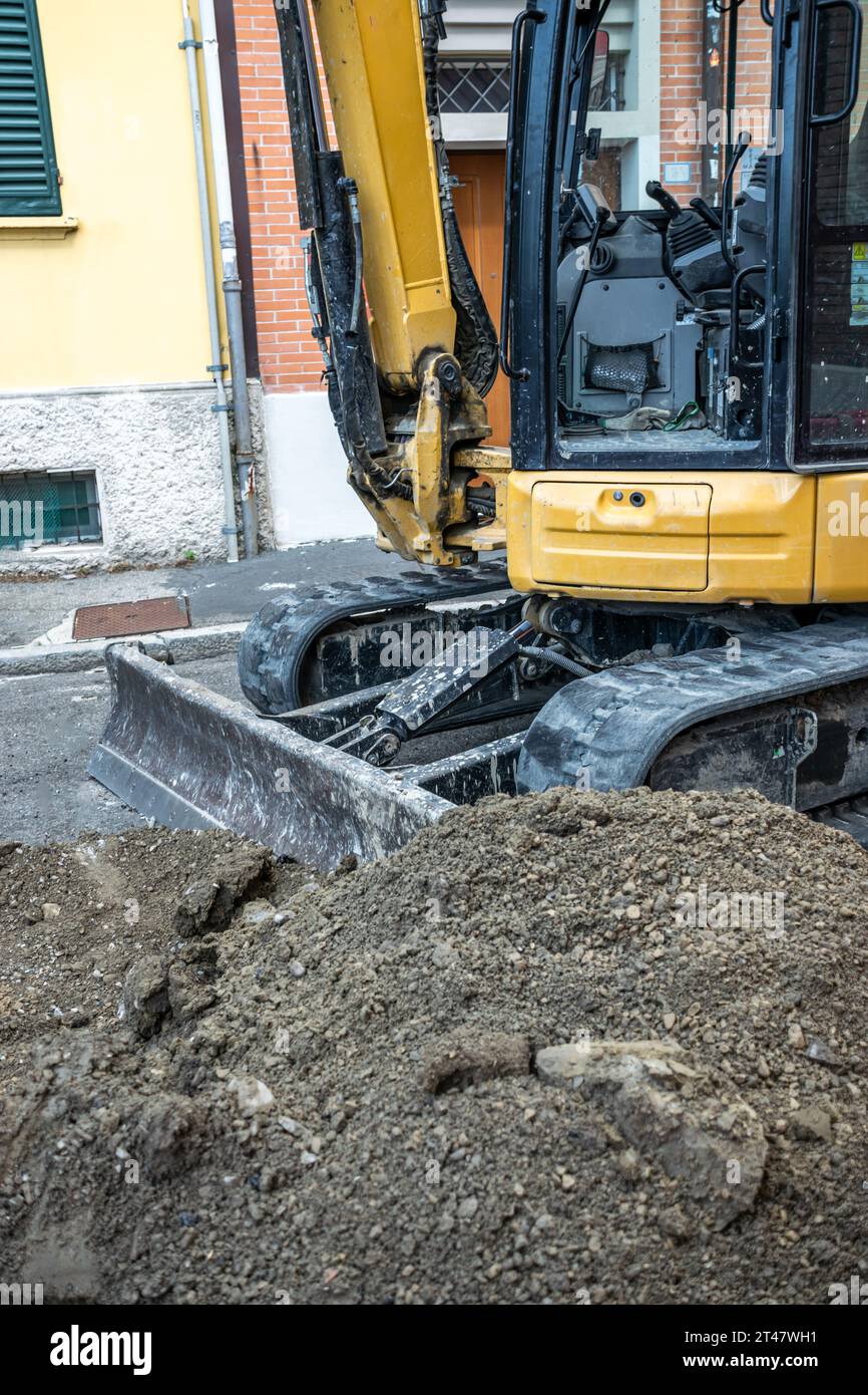 Close up image of excavator in operation digging in ground Stock Photo ...