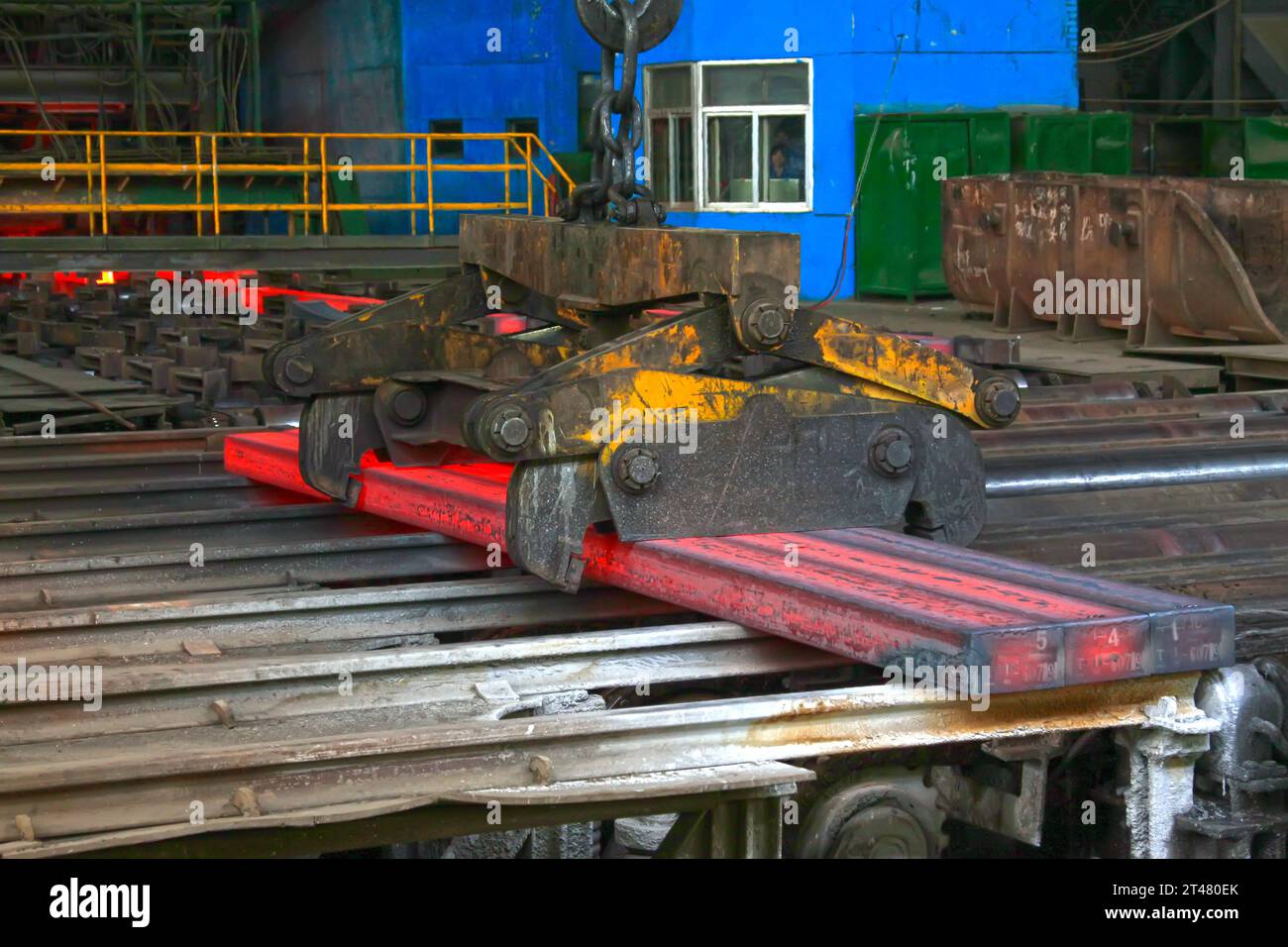 steel ingot hoisting in a workshop, closeup of photo Stock Photo - Alamy