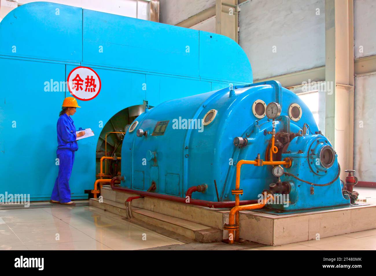 TANGSHAN - JUNE 18: Turbine waste heat power generation system, in a ...