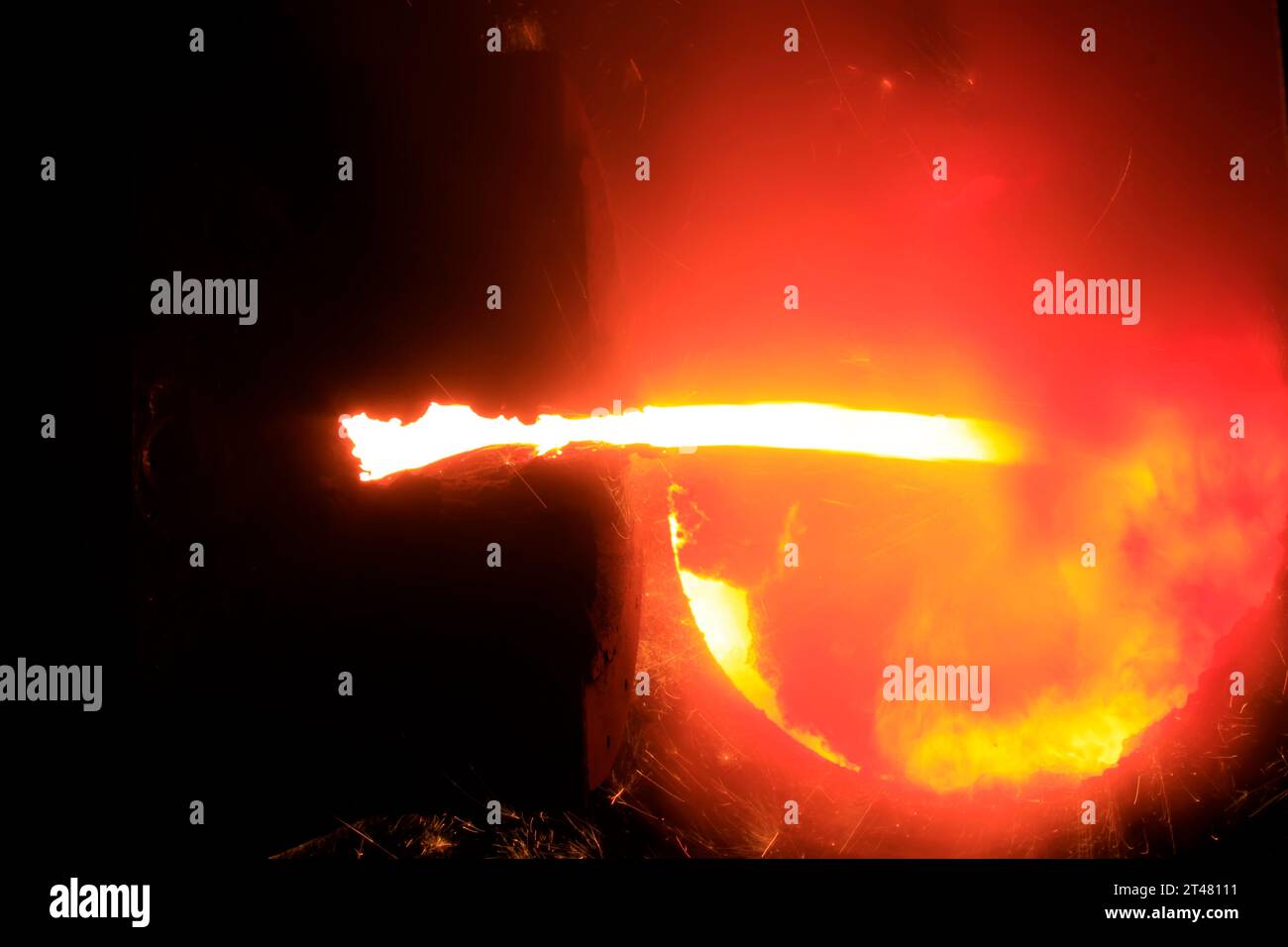 Iron works molten crucible hi-res stock photography and images - Alamy