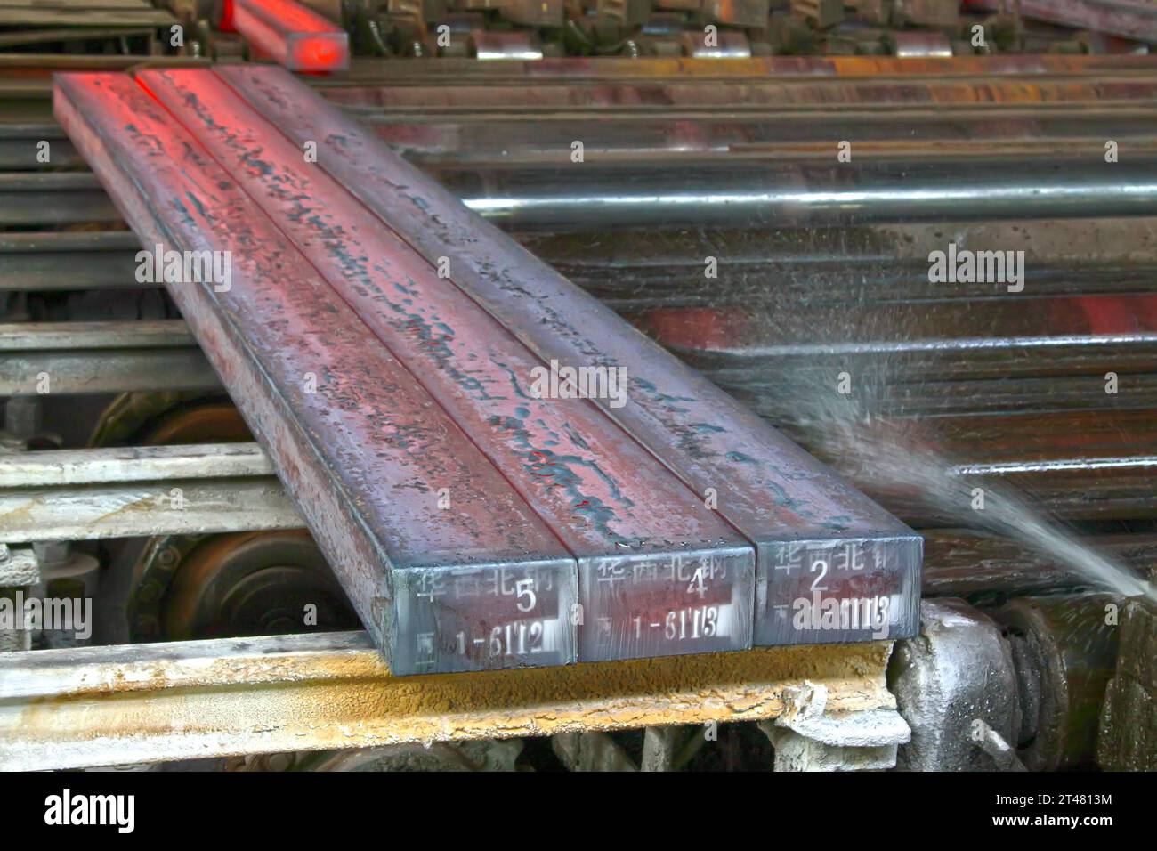 Hot ingot in a steel plant, closeup of photo Stock Photo - Alamy