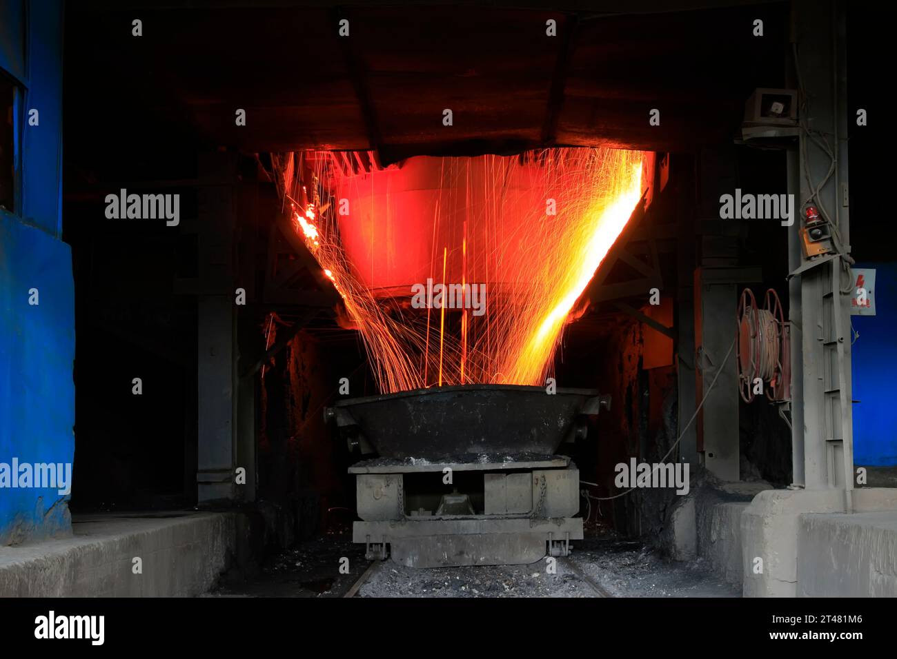 steelmaking converter dumping steel slag in a factory, closeup of photo ...