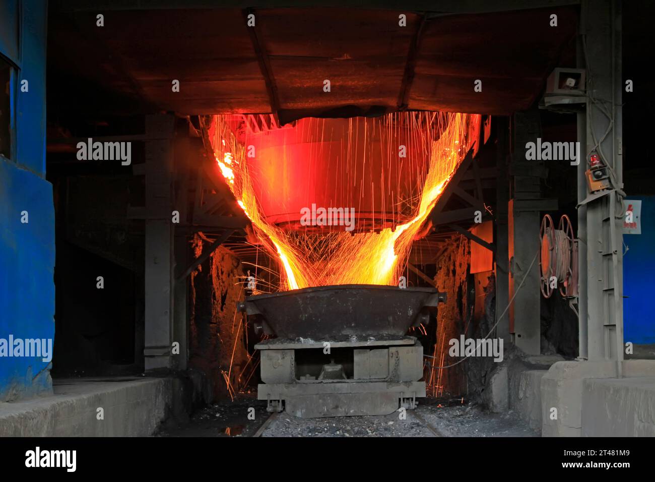 steelmaking converter dumping steel slag in a factory, closeup of photo ...