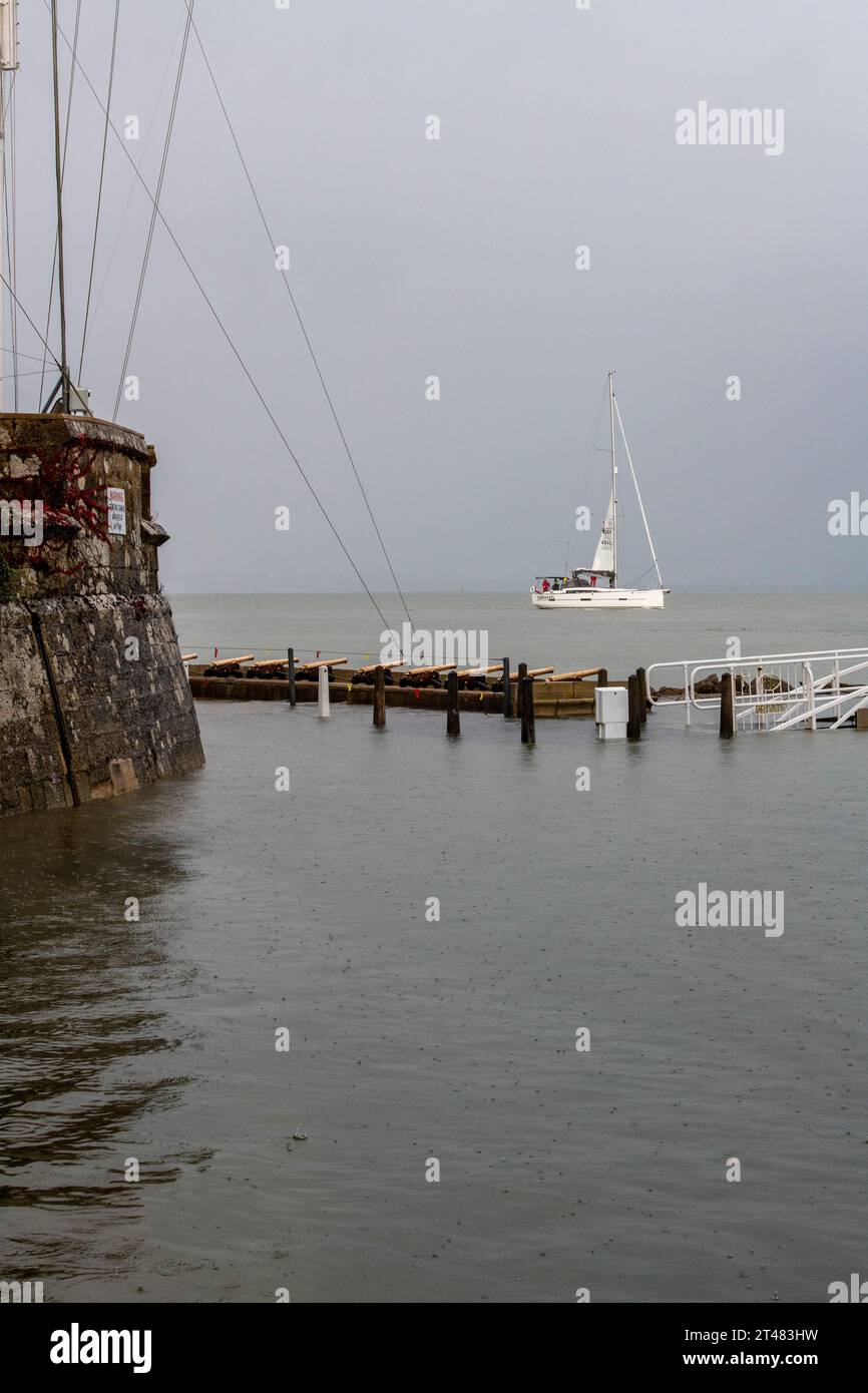 sailing yacht passing the royal yacht squadron in cowes on the isle of ...