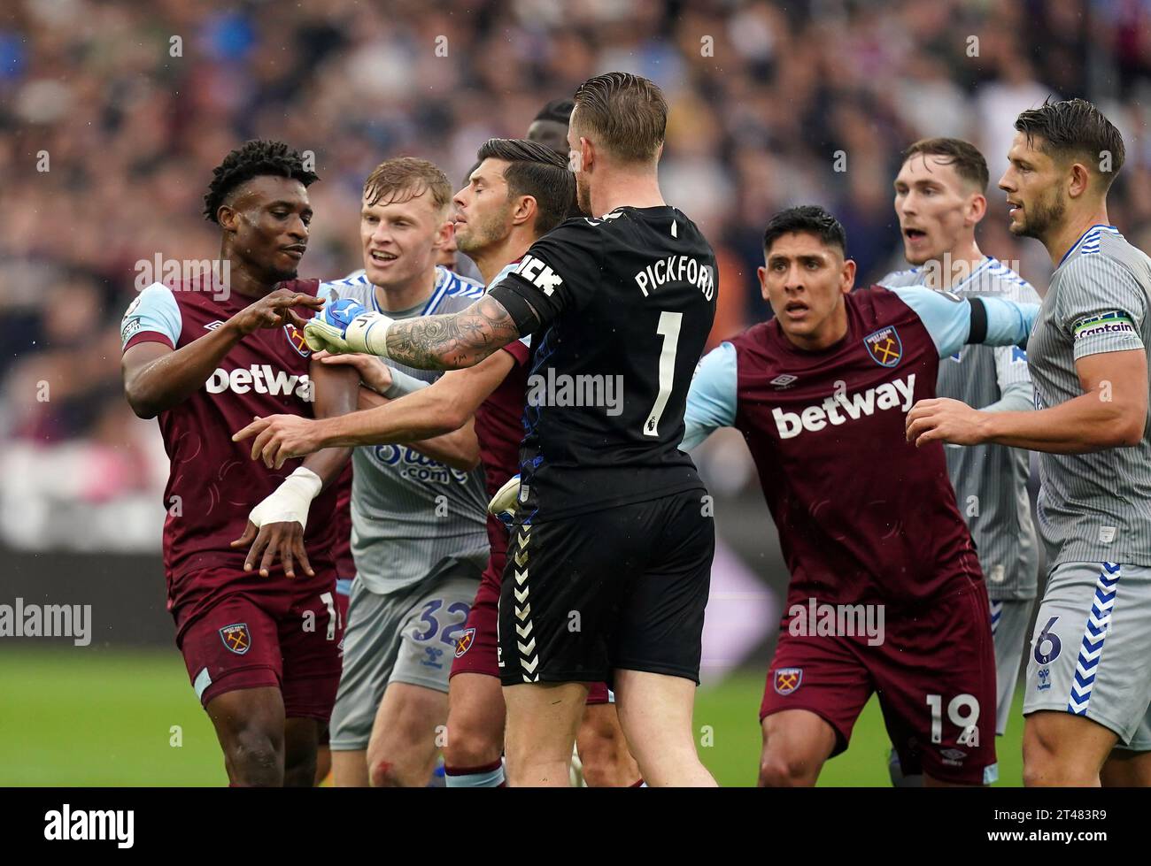 Tempers flare between Everton goalkeeper Jordan Pickford and West Ham United's Mohammed Kudus ...