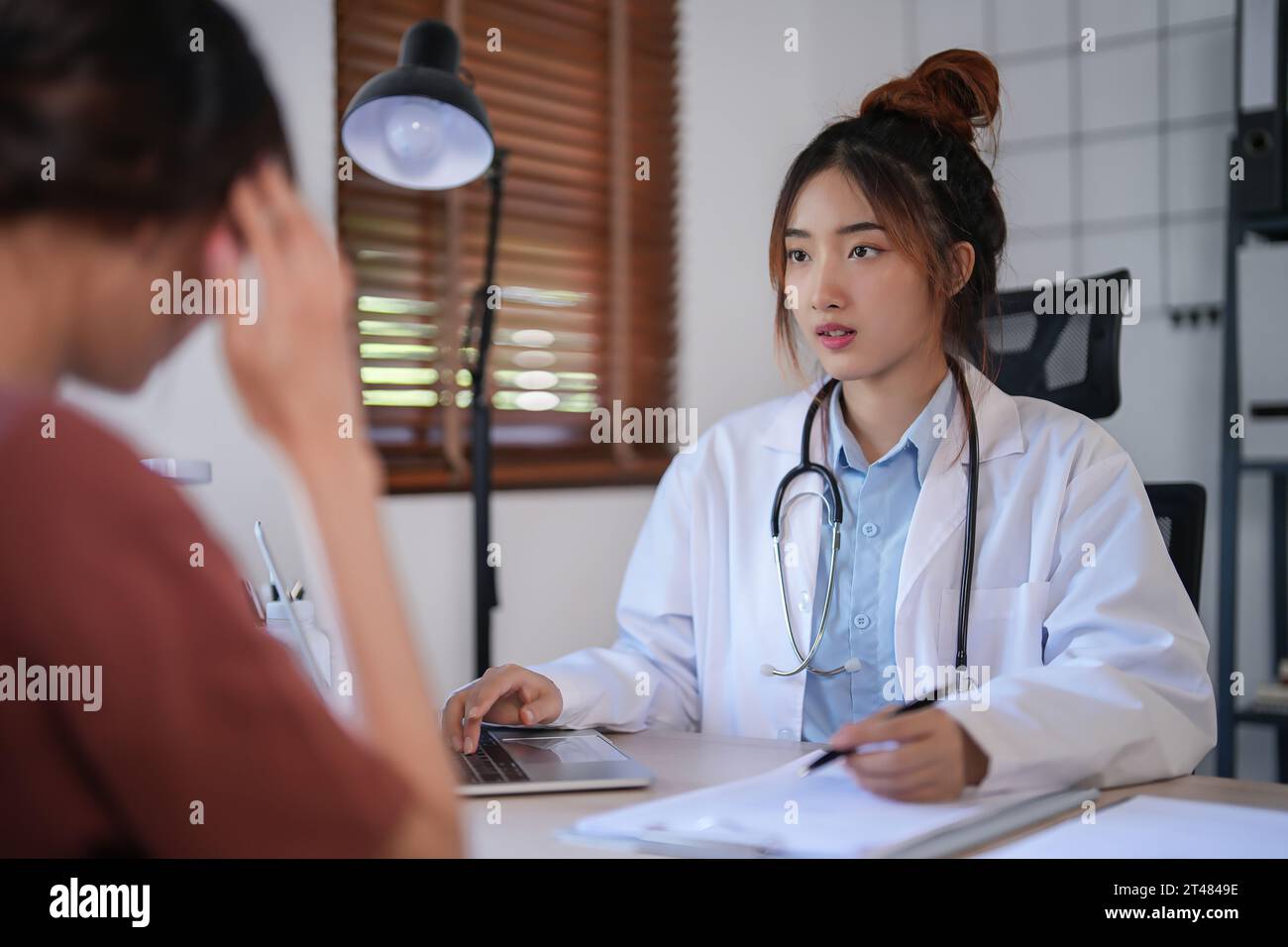 Asian psychologist women giving help and support to counseling about ...