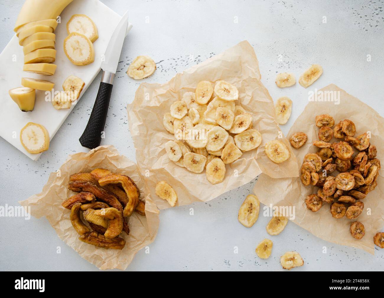 Various crunchy and chewy banana slices and chips snack with raw banana ...