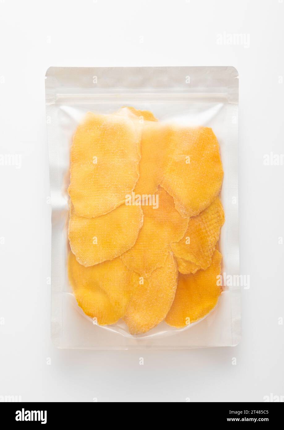 Jumbo pack of dried large sweet mango slices on white background.Top ...