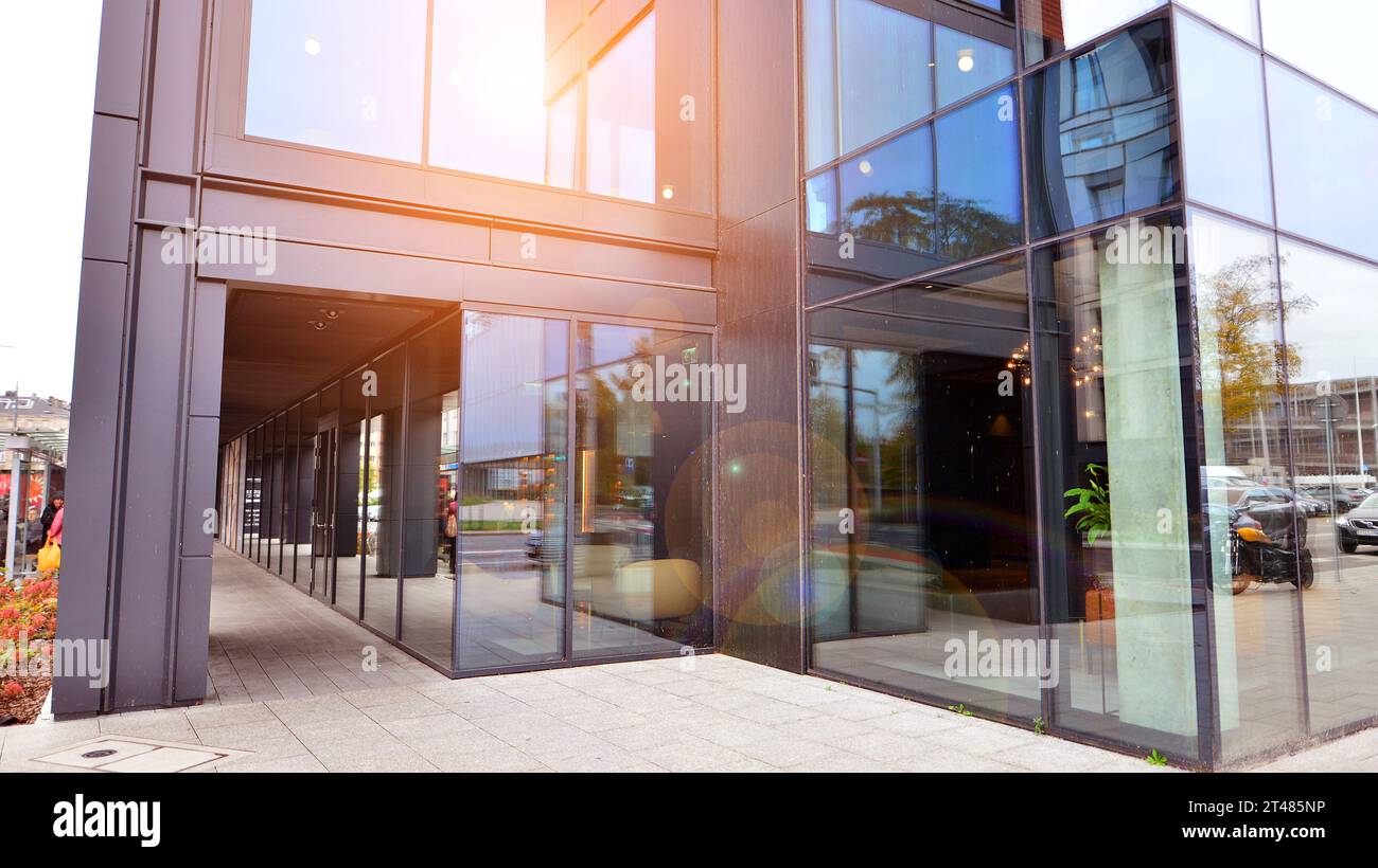 Combination of metal and glass wall material. Steel facade on columns ...