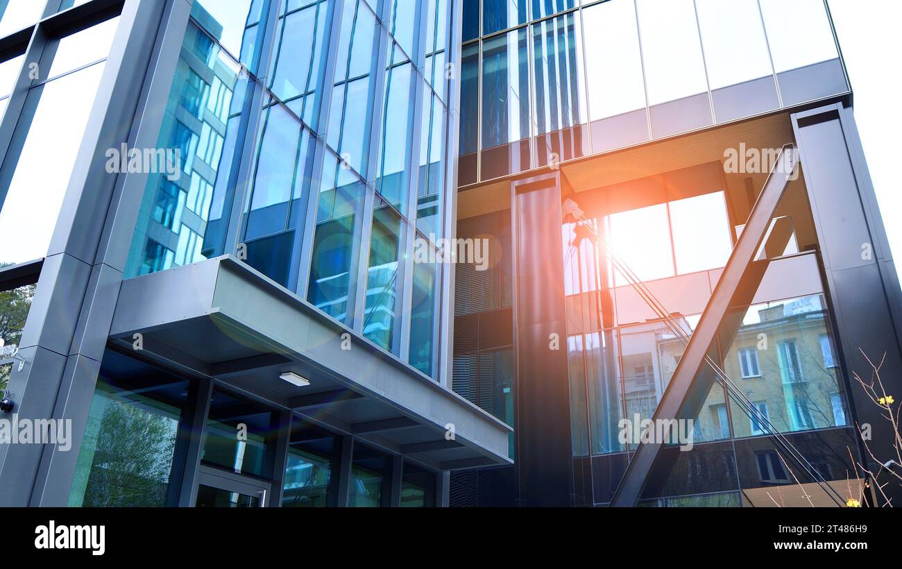 Combination of metal and glass wall material. Steel facade on columns ...