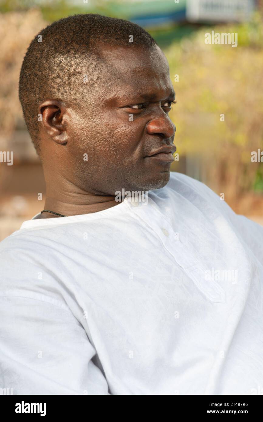 african businessman man in the park having a rest in the lunch break ...