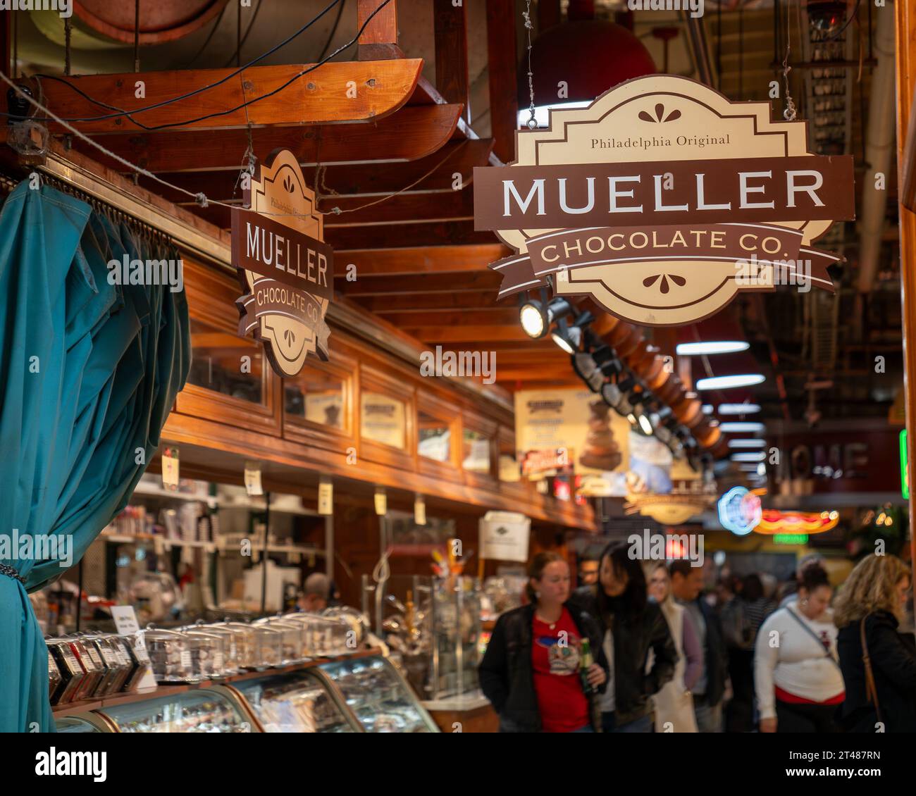 Philadelphia, PA – US – Oct 14, 2023 Customers walking Mueller ...