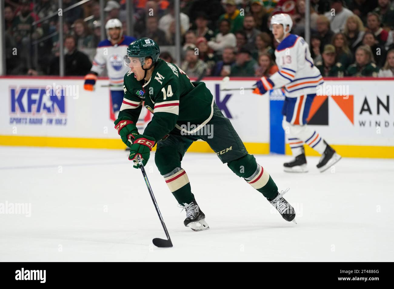 Minnesota Wild center Joel Eriksson Ek (14) skates with the puck during ...