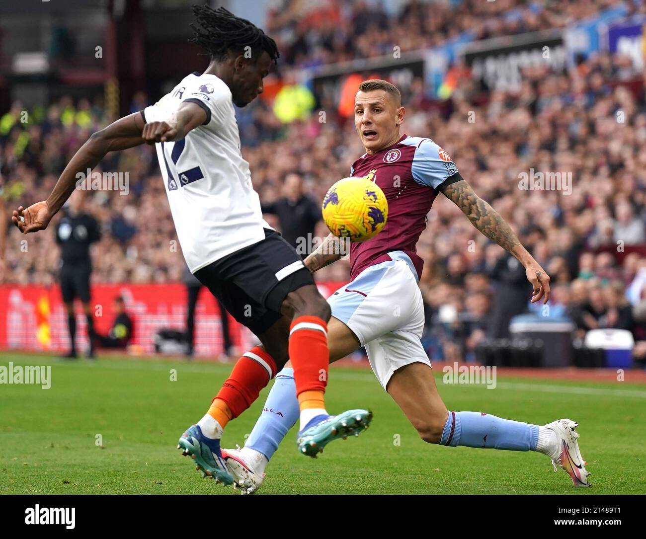Luton Town's Issa Kabore (left) and Aston Villa's Lucas Digne battle ...