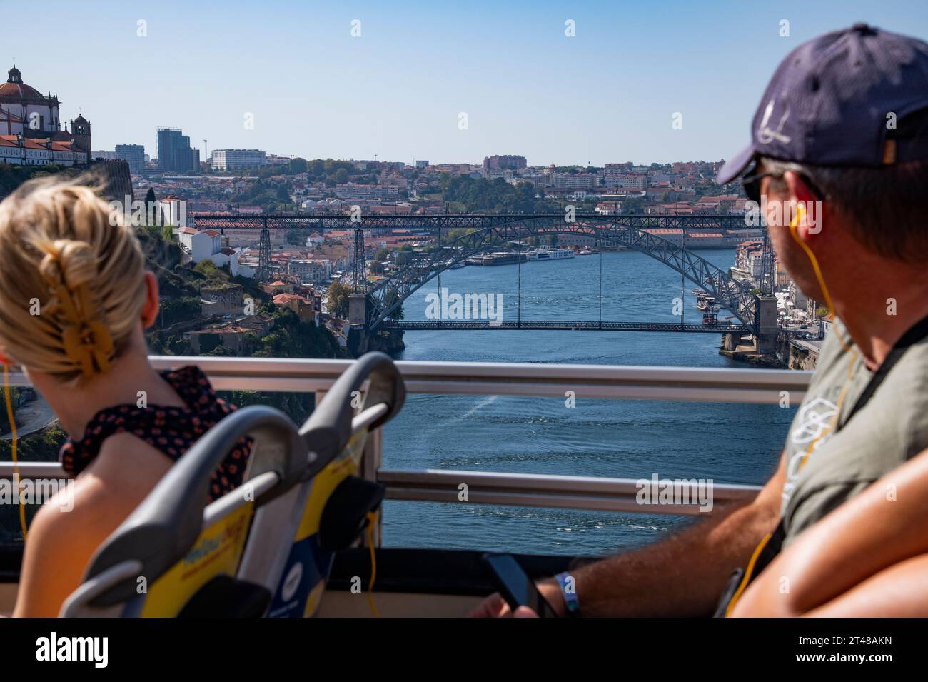 Tourist open top bus ride around Porto, Portugal Stock Photo - Alamy