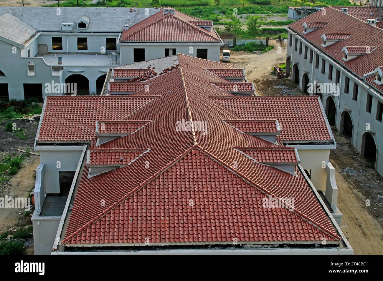Unfinished buildings tile roof, closeup of photo Stock Photo - Alamy