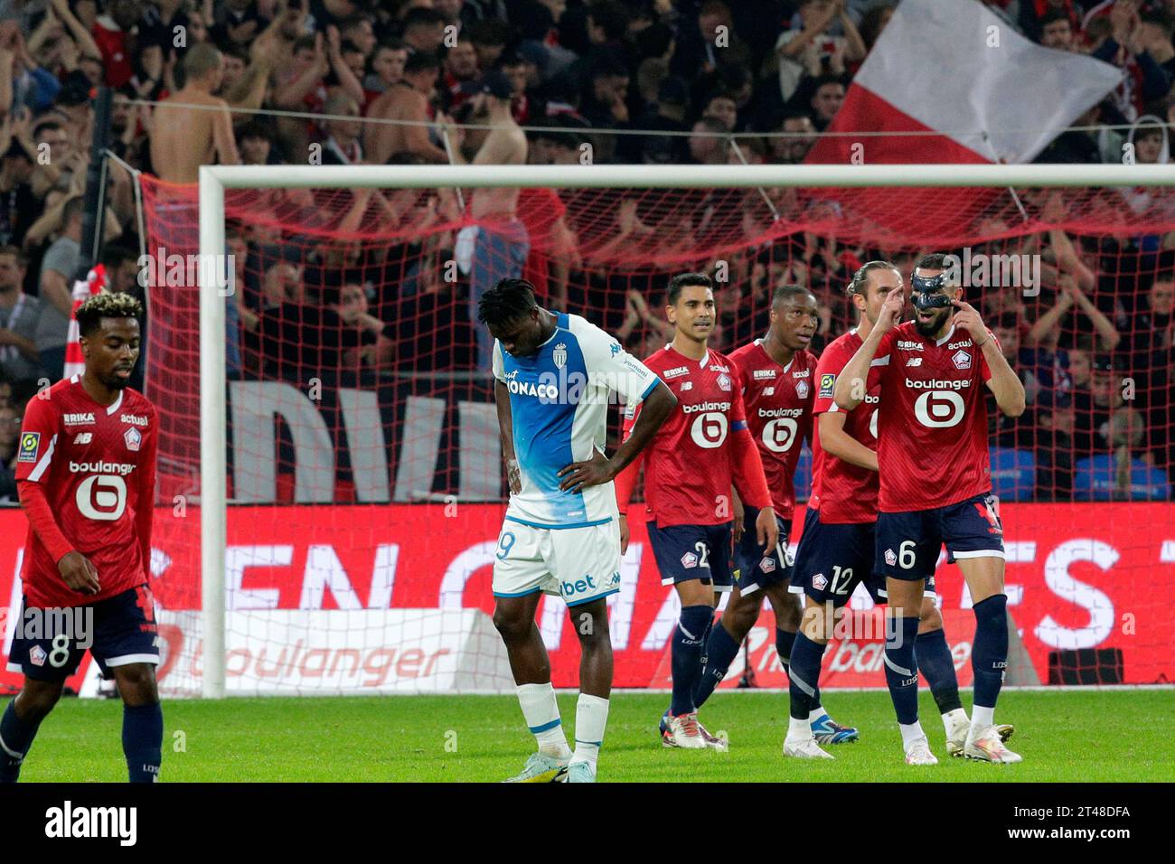 Lille's players celebrate after scoring during the French League One ...